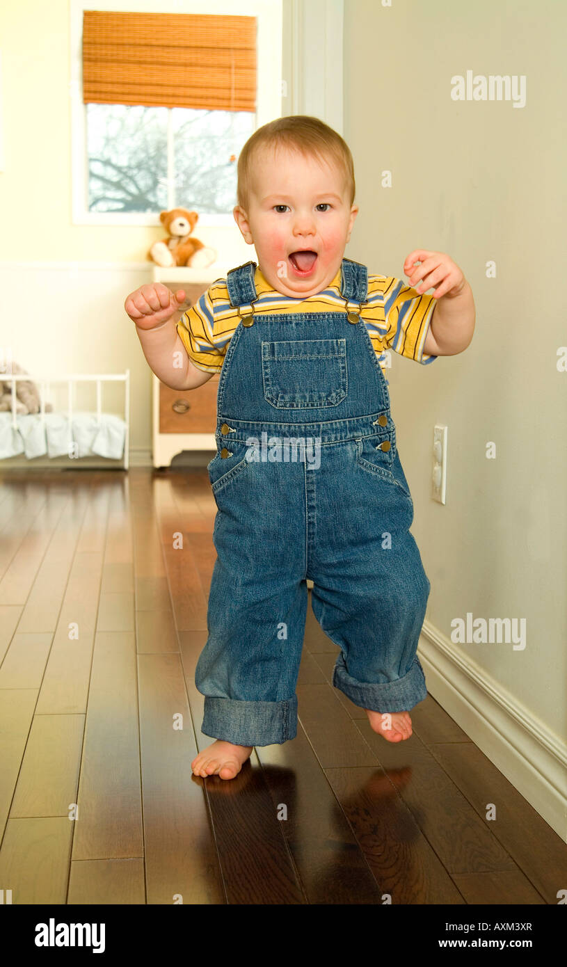 Baby Learning To Walk Stock Photo - Alamy