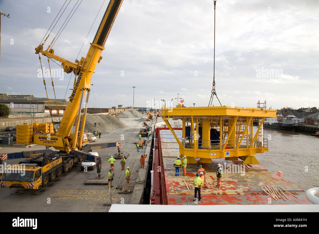 Rig platform being loaded onto container ship at Yarmouth Stock Photo ...