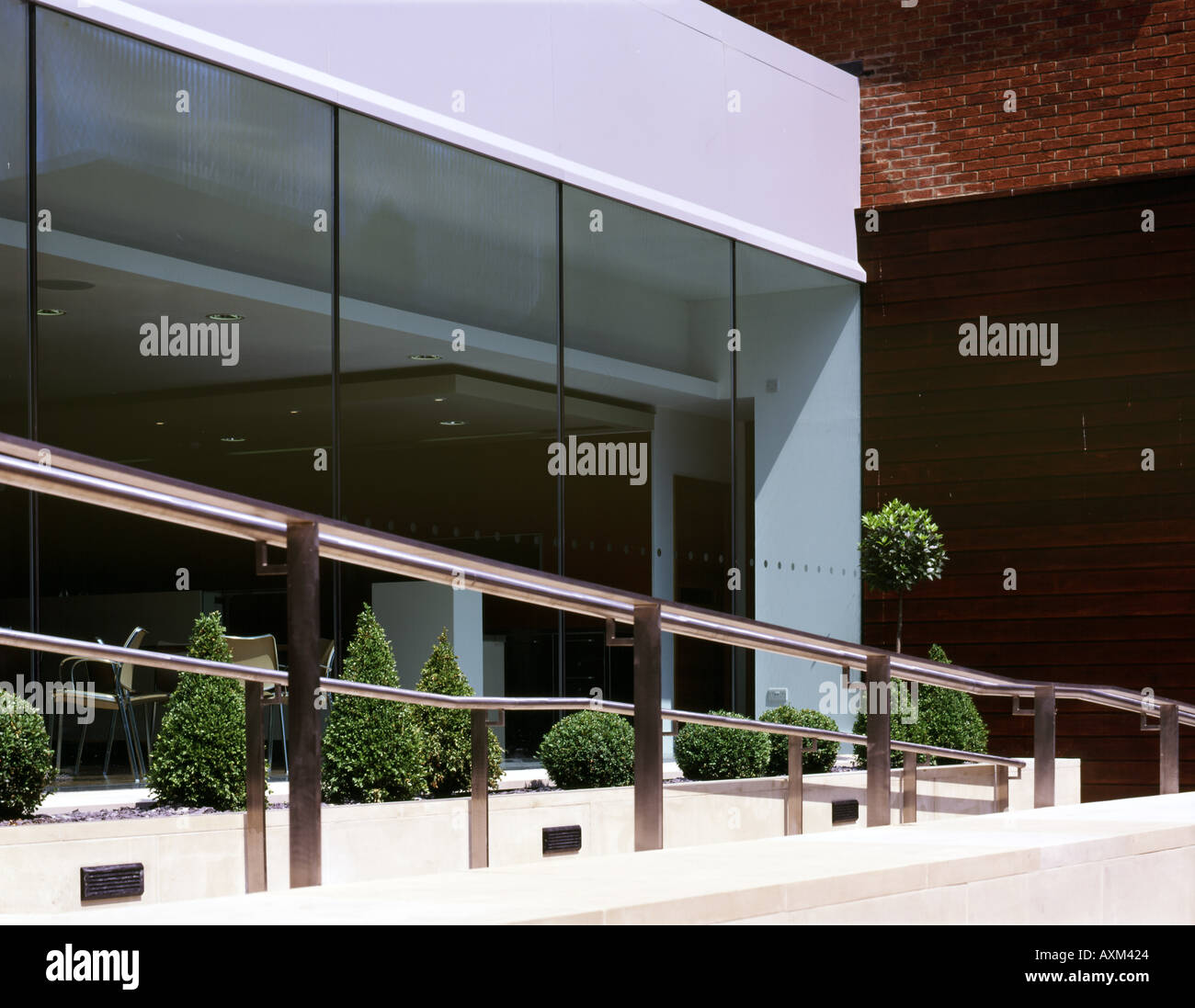 Uk swimming pool topiary hi-res stock photography and images - Alamy