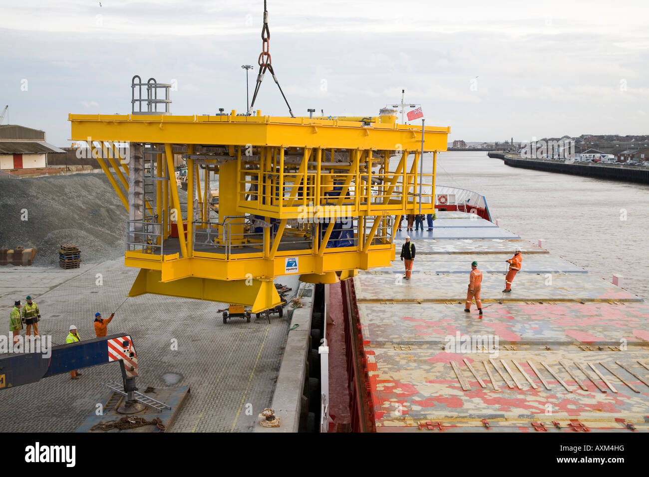 Rig platform being loaded onto container ship at Yarmouth Stock Photo ...