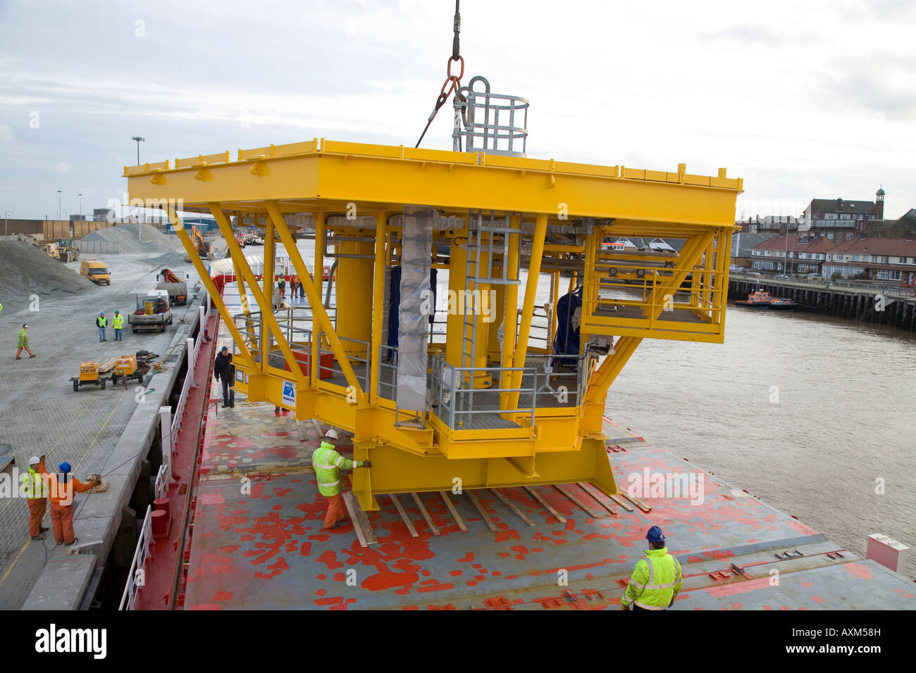 Rig platform being loaded onto container ship at Yarmouth Stock Photo ...