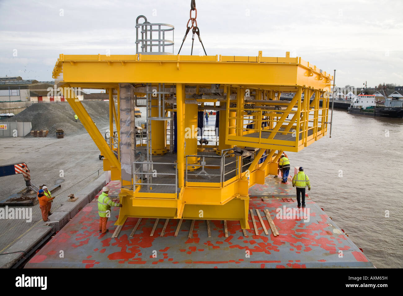 Rig platform being loaded onto container ship at Yarmouth Stock Photo ...