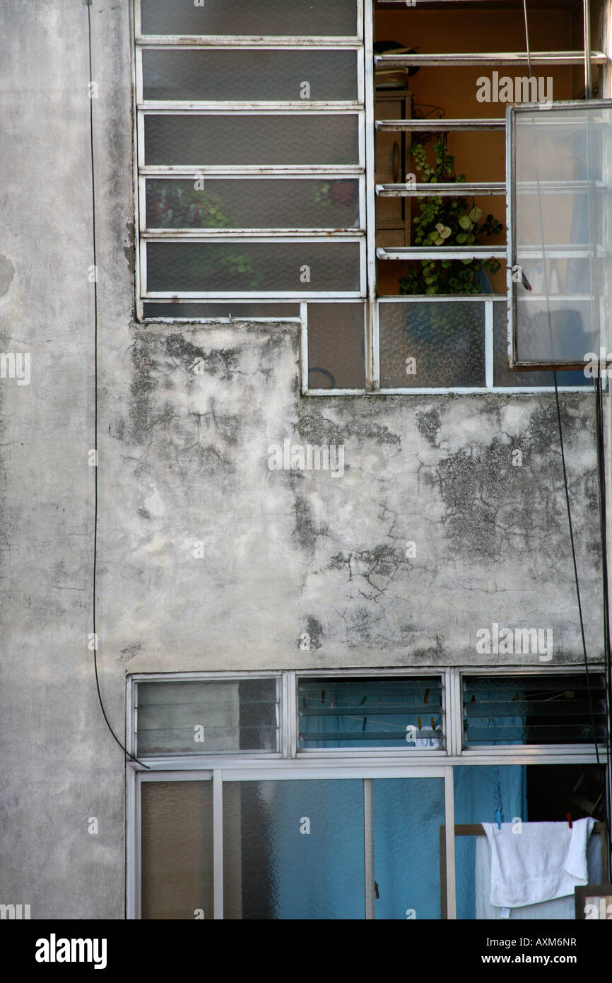 The crumbling wall of aging apartment building Stock Photo - Alamy