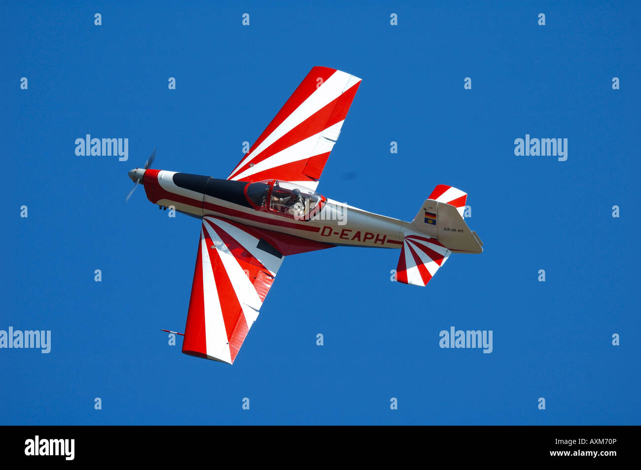 Red plane with white stripes hi-res stock photography and images - Alamy