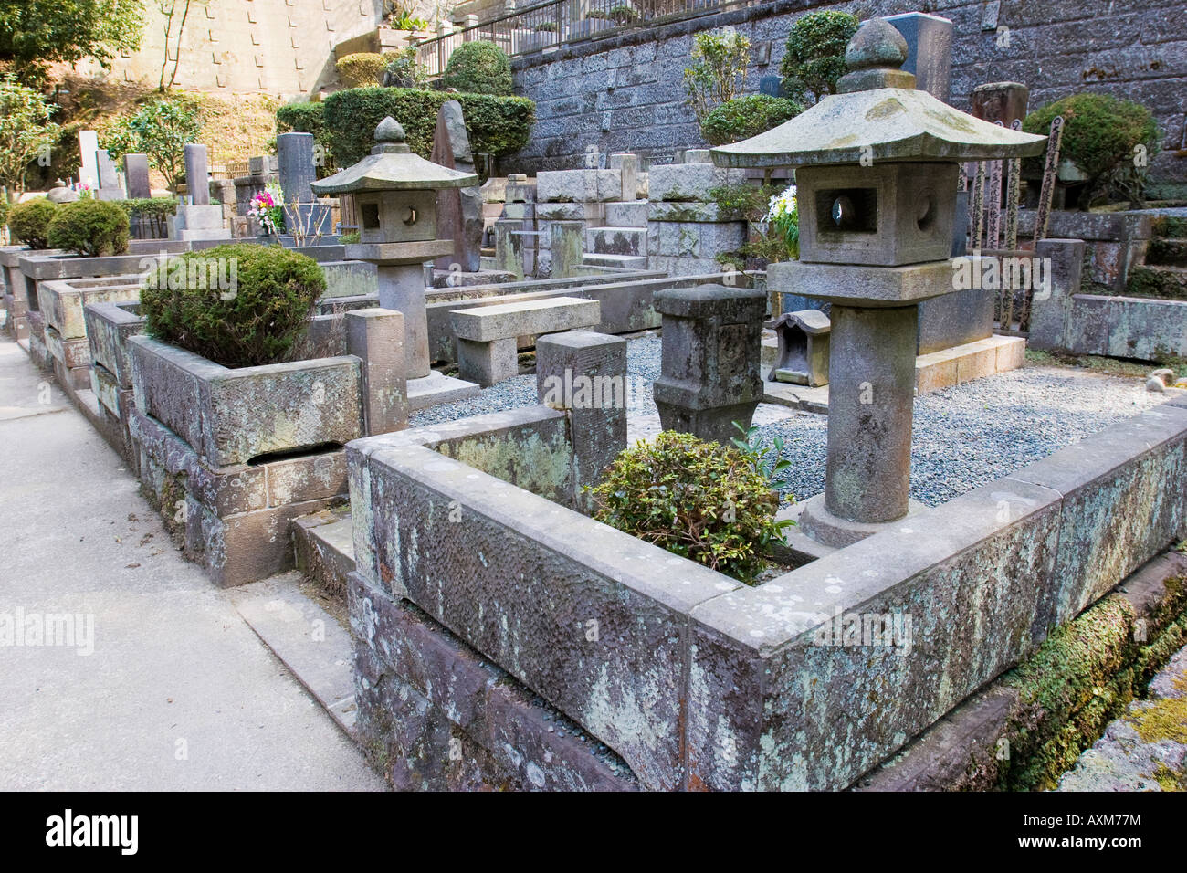 Graves in Japanese cemetery plots in Engakuji Zen Buddhist temple in ...