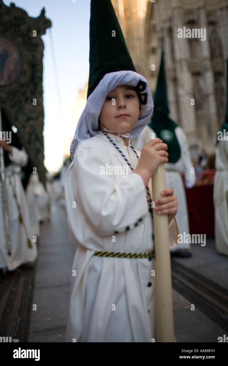Young penitent with raised hood Stock Photo - Alamy