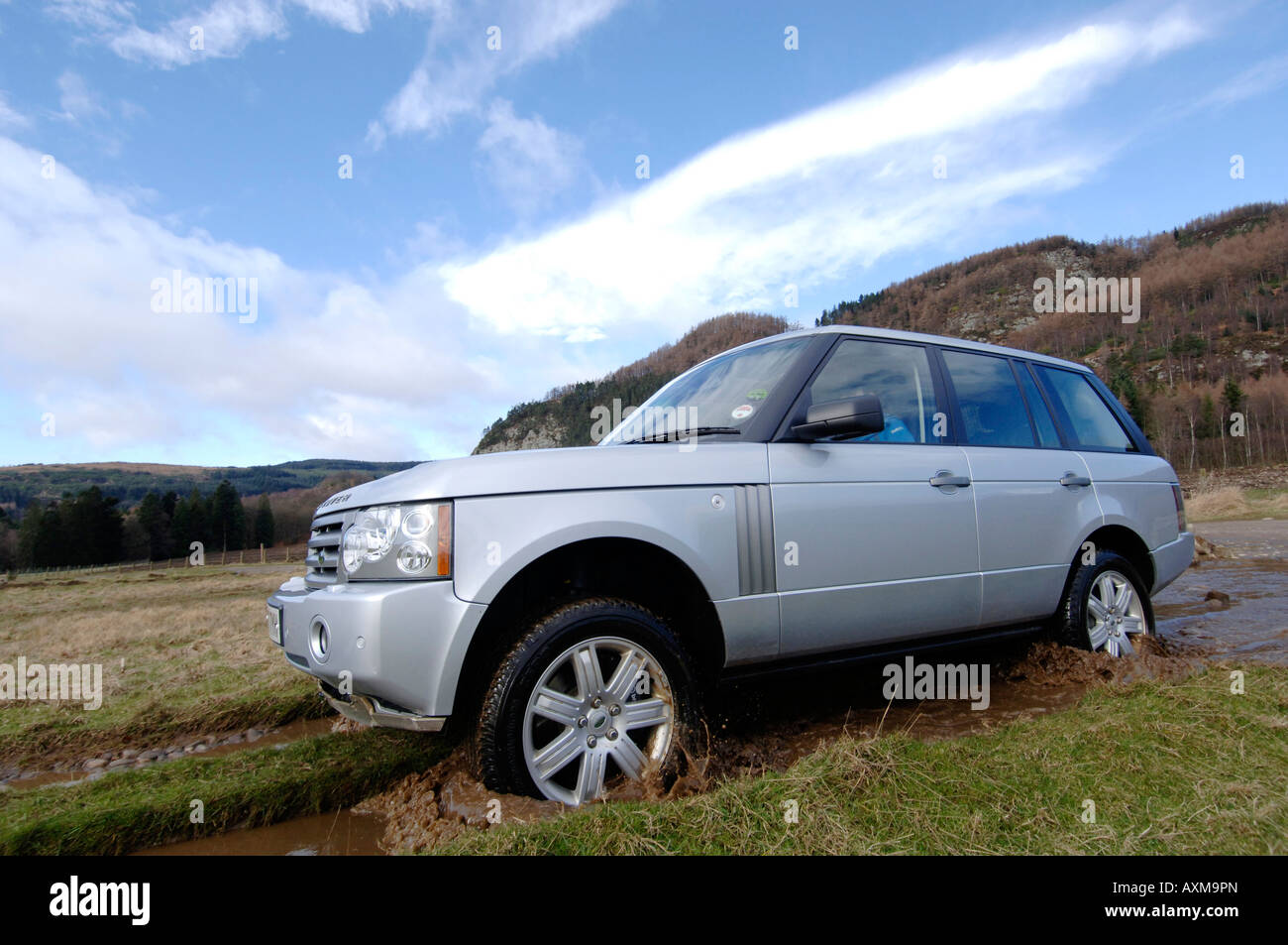 Land Rover 4 x 4 experience driving in Dunkeld Scotland Stock Photo - Alamy