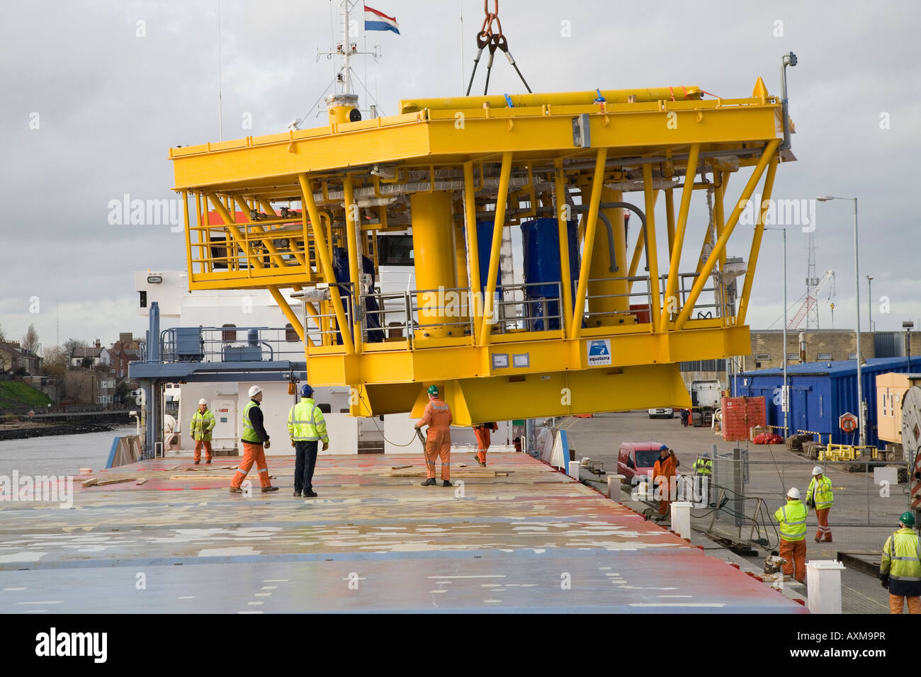 Rig platform being loaded onto container ship at Yarmouth Stock Photo ...