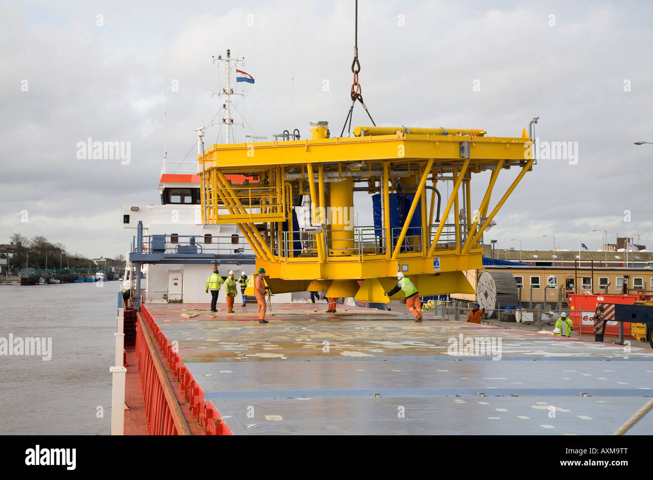 Rig platform being loaded onto container ship at Yarmouth Stock Photo ...