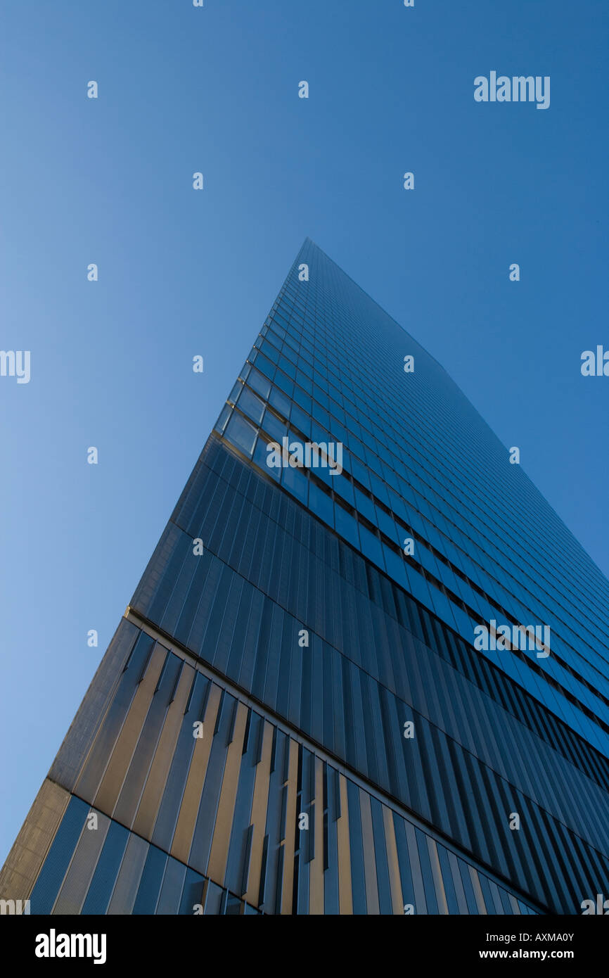 The exaggerated perspective looking up at a skyscraper within the World ...