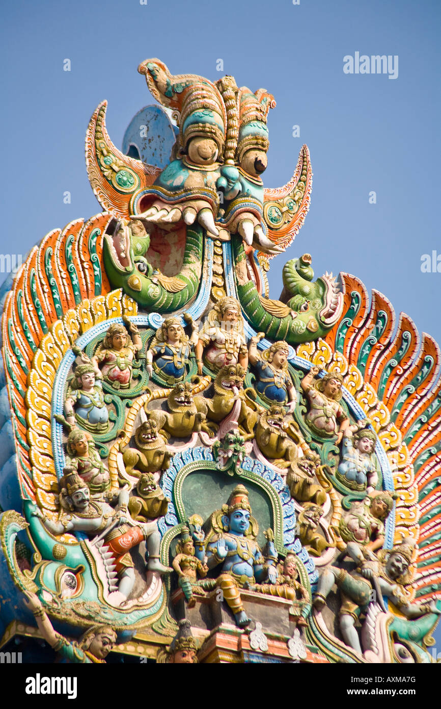 Carved figures on top of a gopuram, Meenakshi Temple, Madurai, Tamil ...