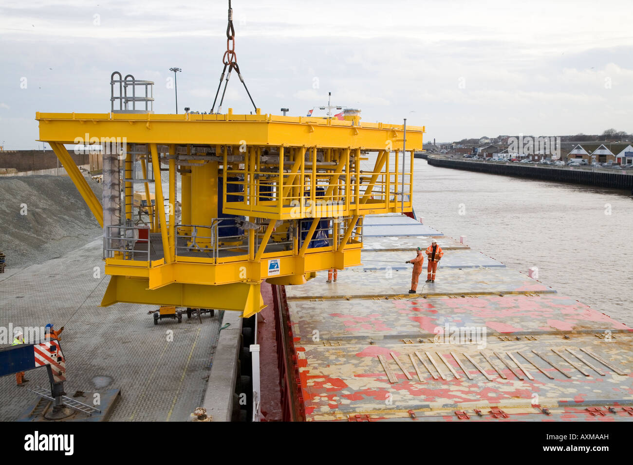 Rig platform being loaded onto container ship at Yarmouth Stock Photo ...