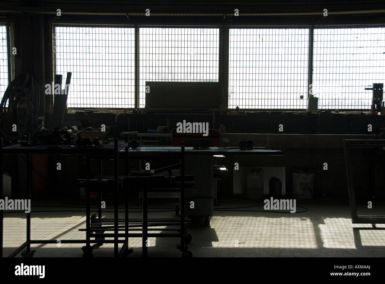 Stock photo of barred windows in a light industrial factory unit The ...