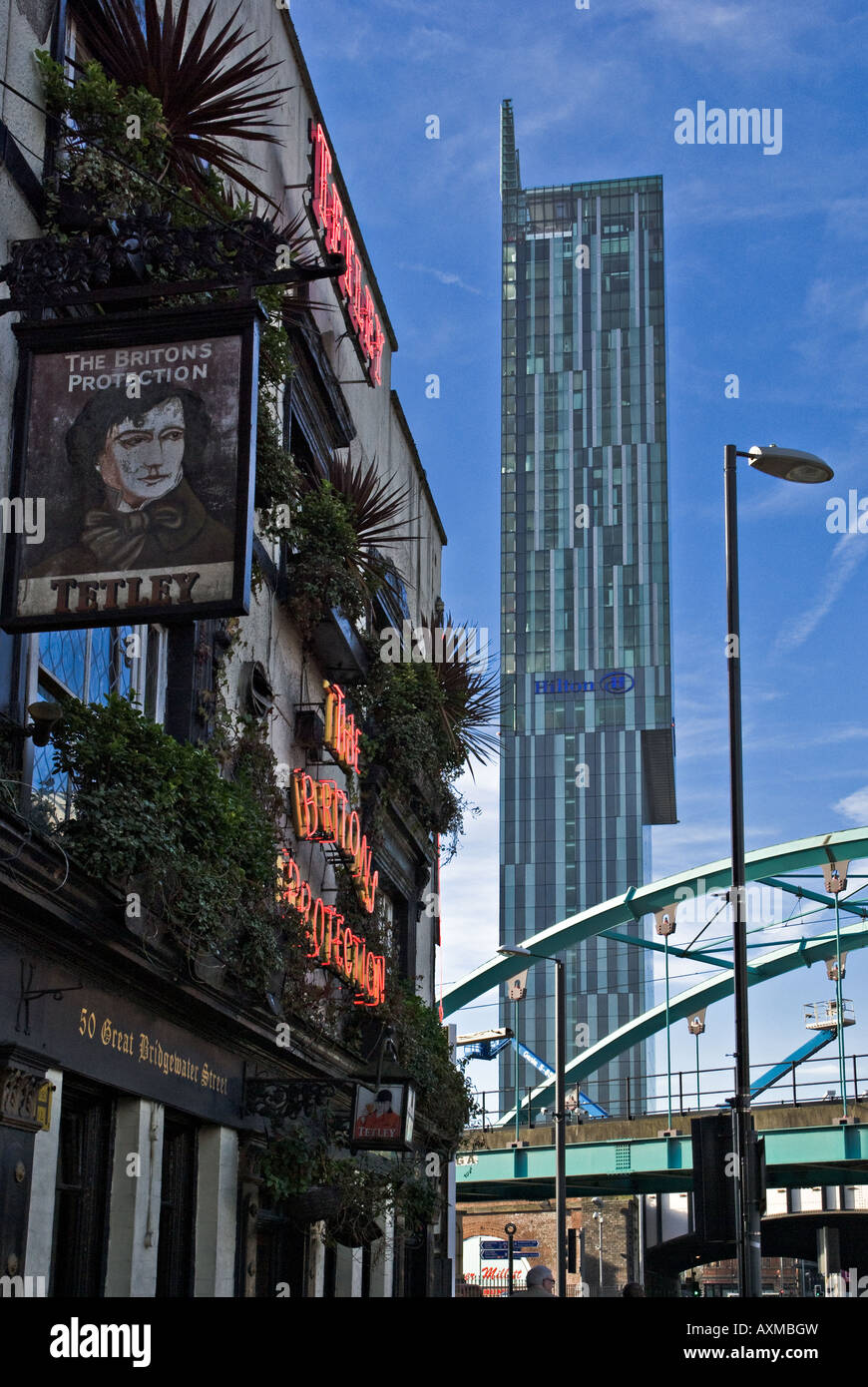 The Britons Protection pub and the HIlton Hotel Manchester Stock Photo ...