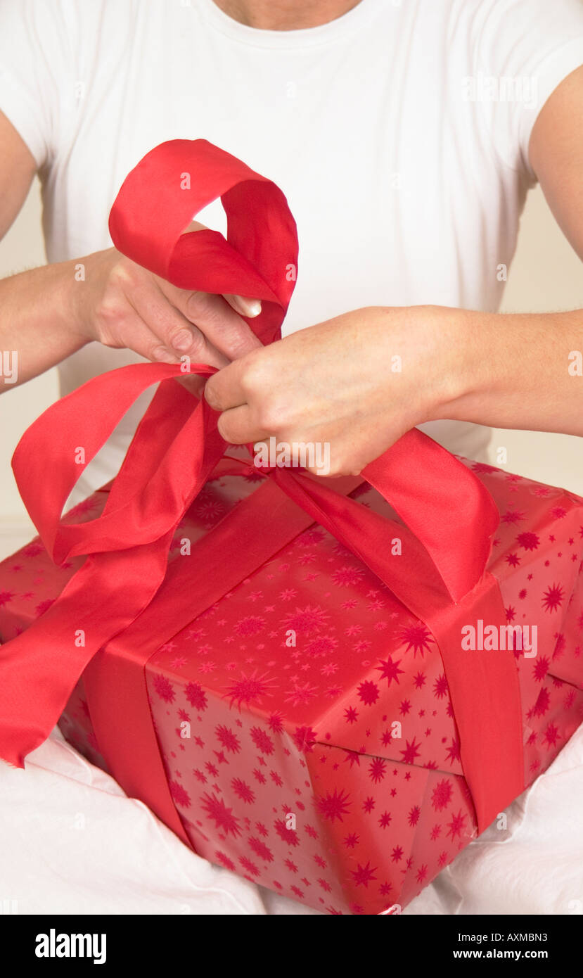 Wrapping a parcel woman hi-res stock photography and images - Alamy