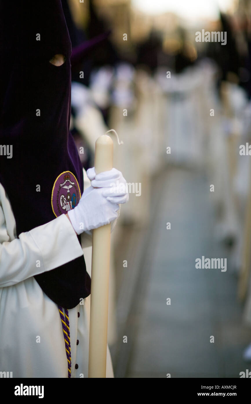 Row of hooded penitents, Holy Week, Seville, Spain Stock Photo - Alamy