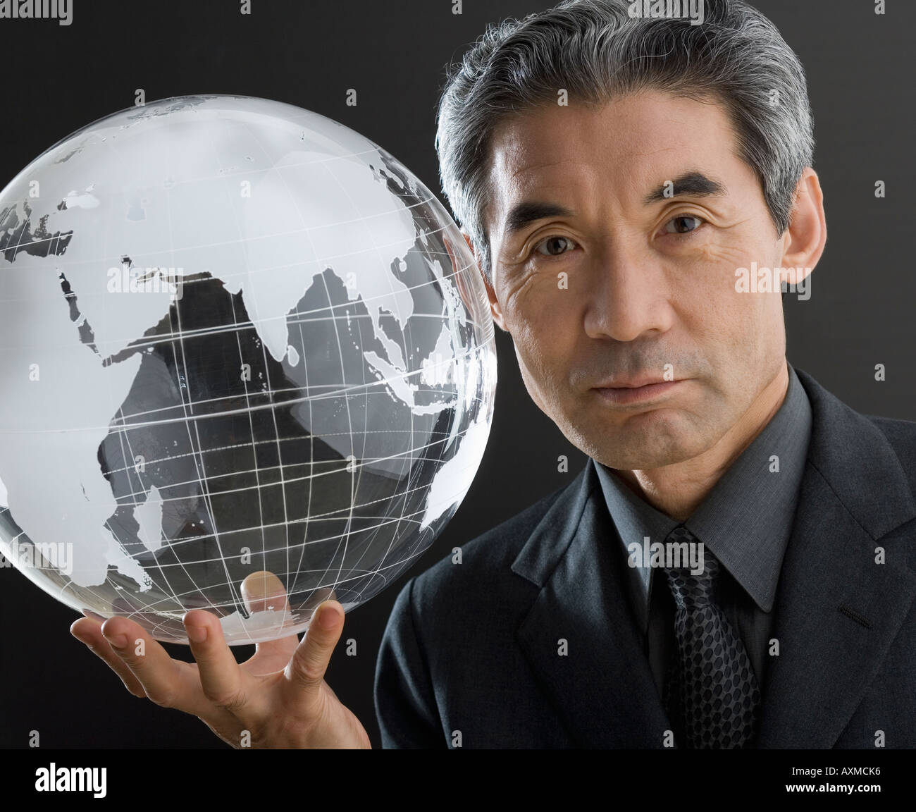 Asian man holding globe hi-res stock photography and images - Alamy Asian man holding globe hi-res stock photography and images - Alamy