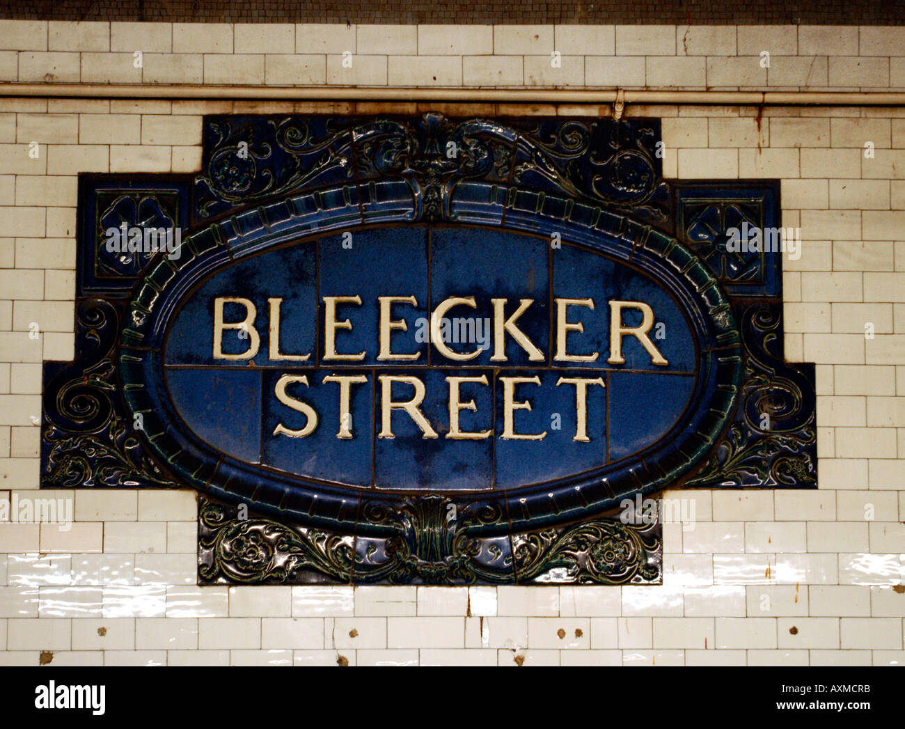 Blue ceramic Bleecker Street subway sign at the Bleecker Street subway ...