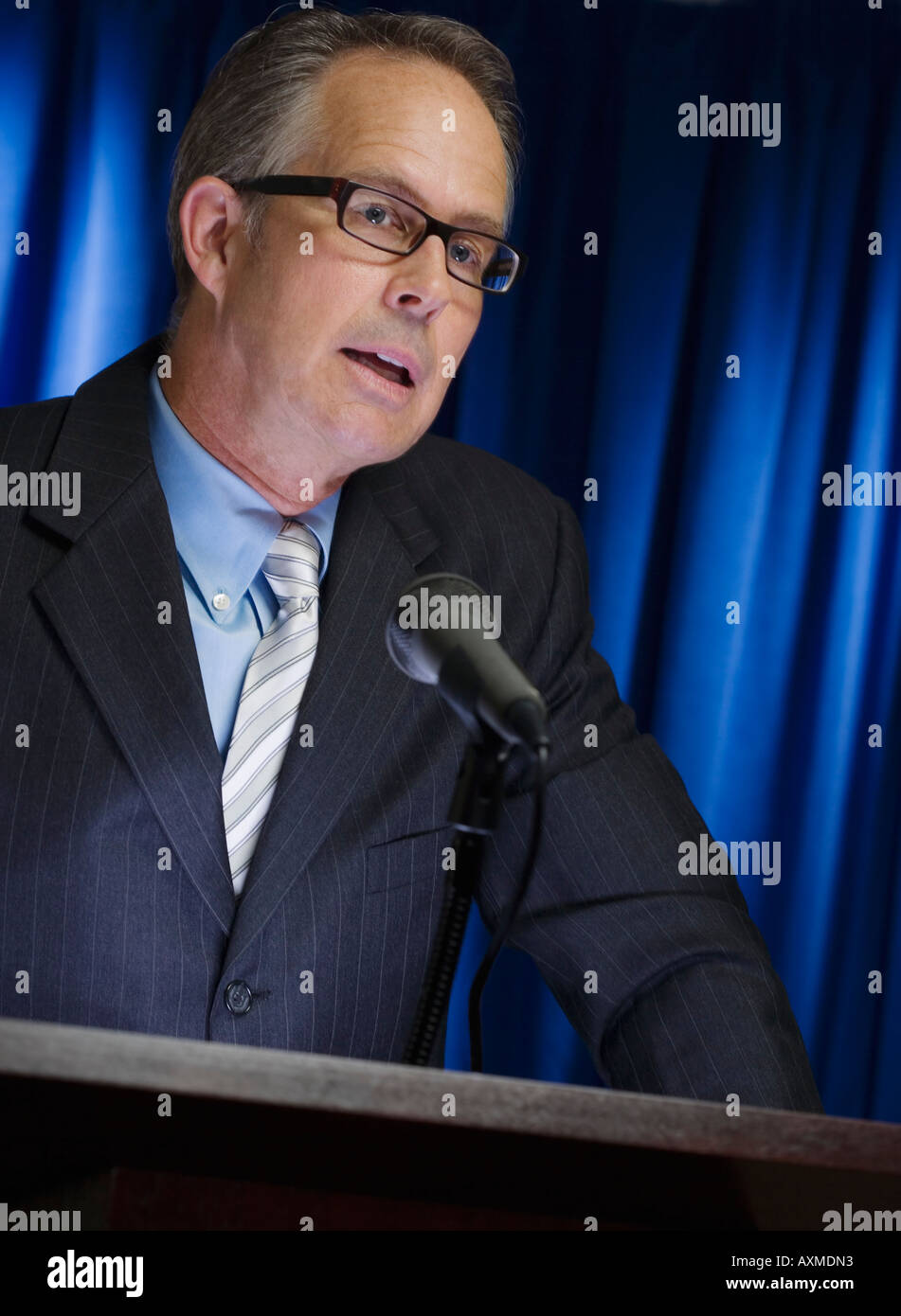 Close up speaker standing podium hi-res stock photography and images ...