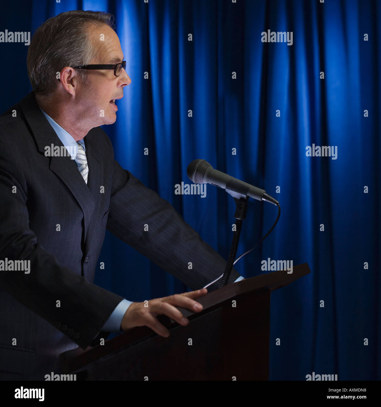 Businessman speaking at podium hi-res stock photography and images - Alamy