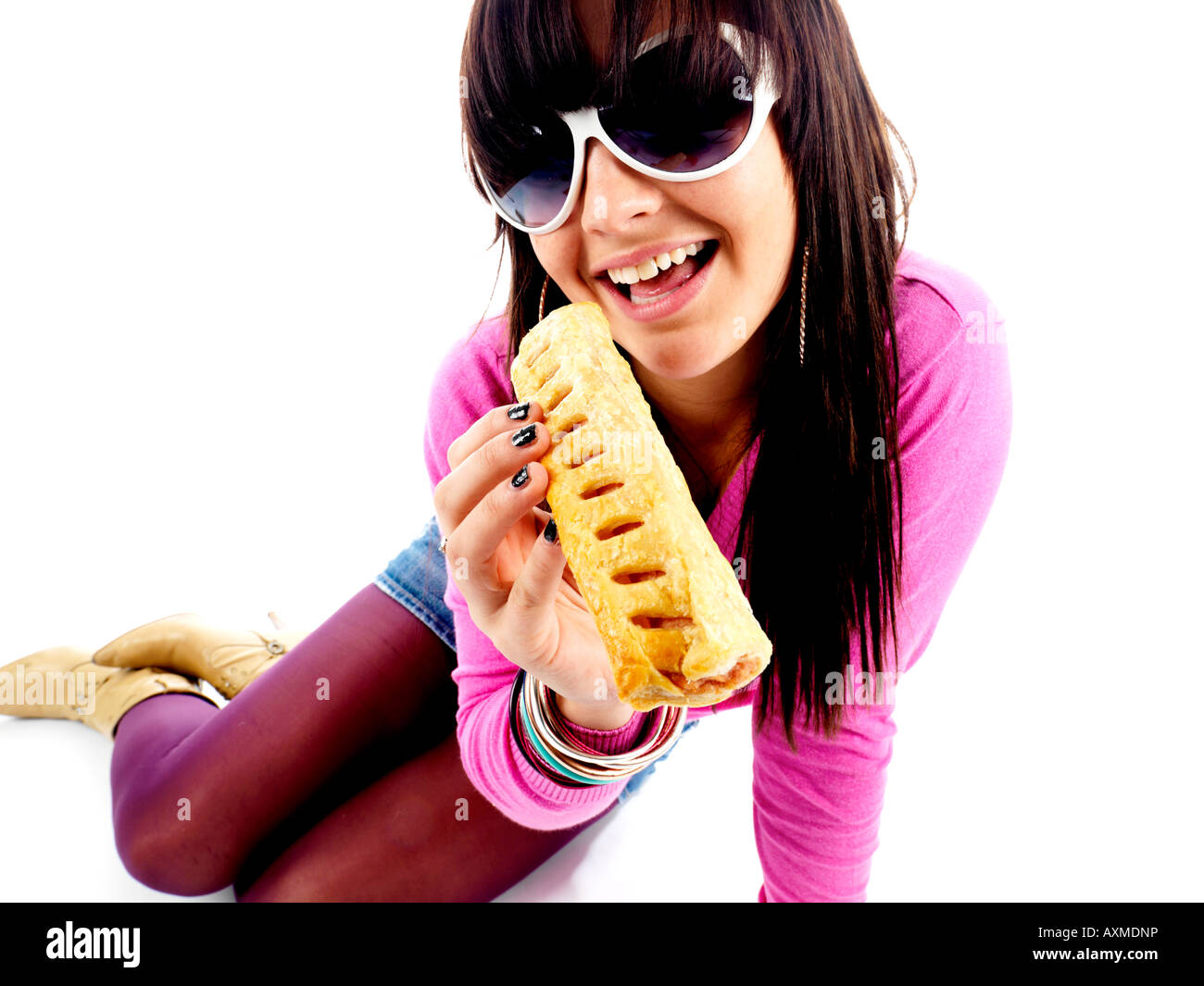 Teenage Girl Eating Sausage Roll Model Released Stock Photo - Alamy