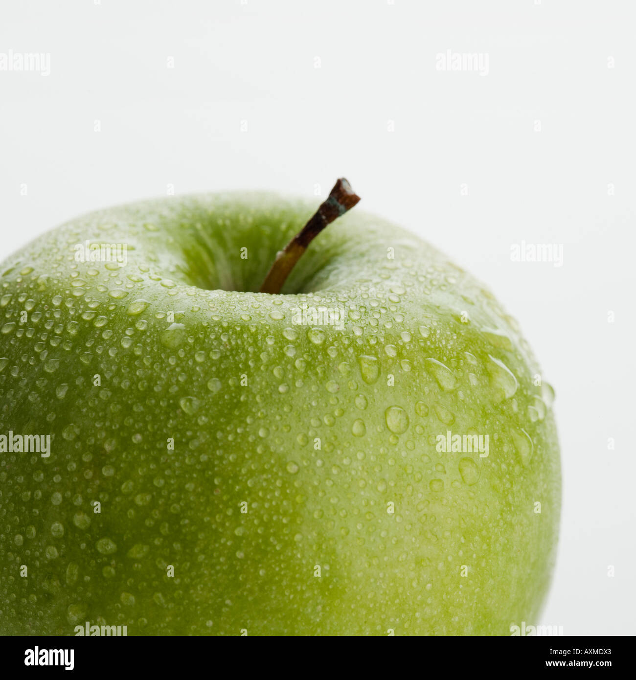 Close up of apple with water droplets Stock Photo - Alamy