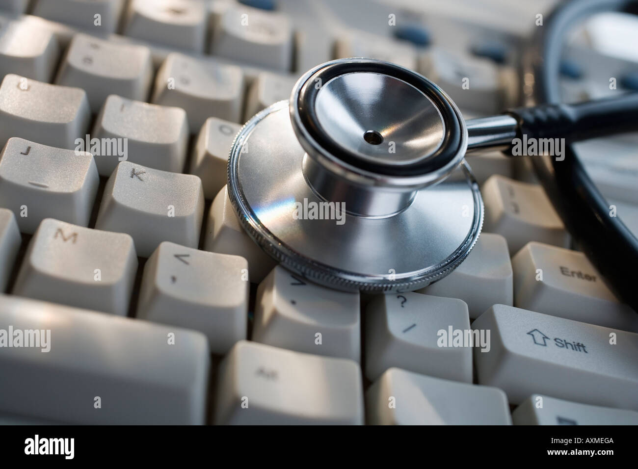 Close up of stethoscope on computer keyboard Stock Photo - Alamy