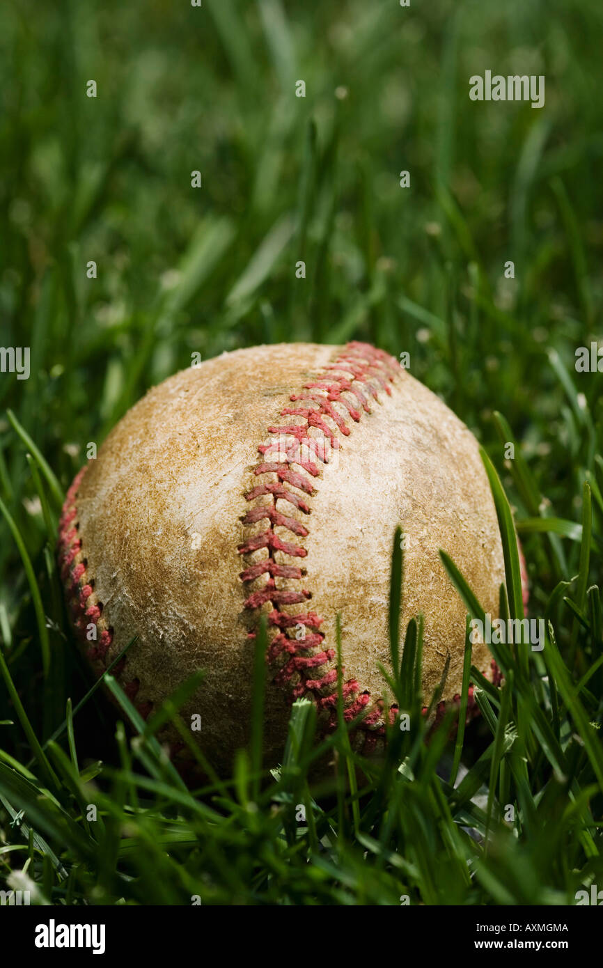 Baseball in grass vertical hi-res stock photography and images - Alamy