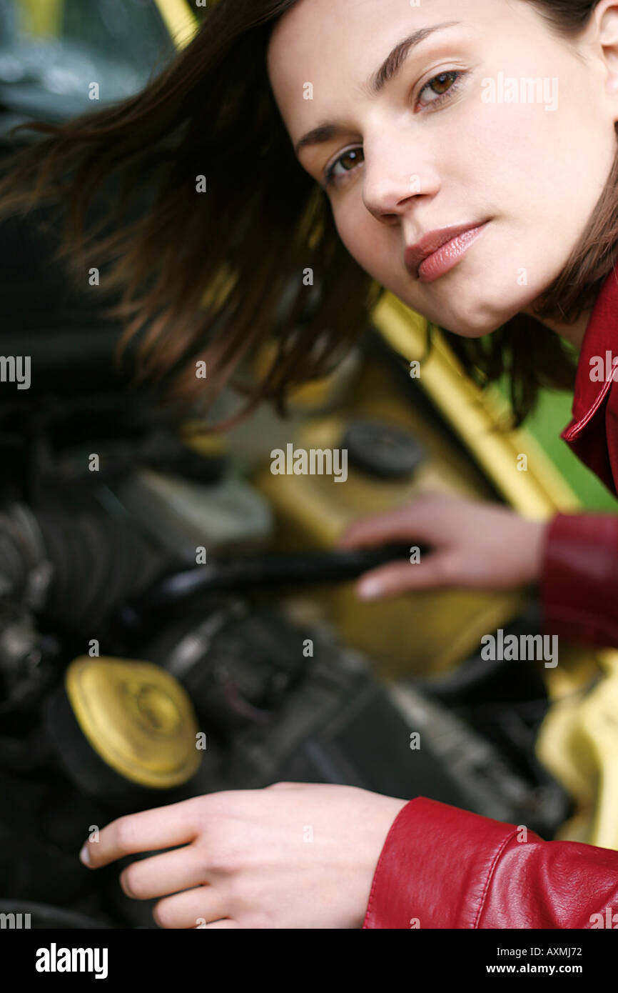 Woman fixing a car hi-res stock photography and images - Alamy
