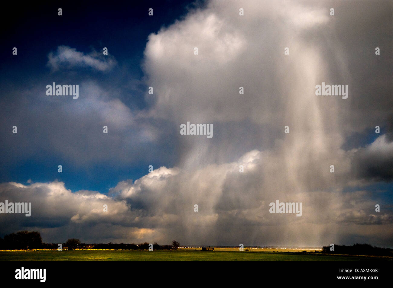UK weather - a dramatic rain shower over the coast at Brightlingsea. UK ...