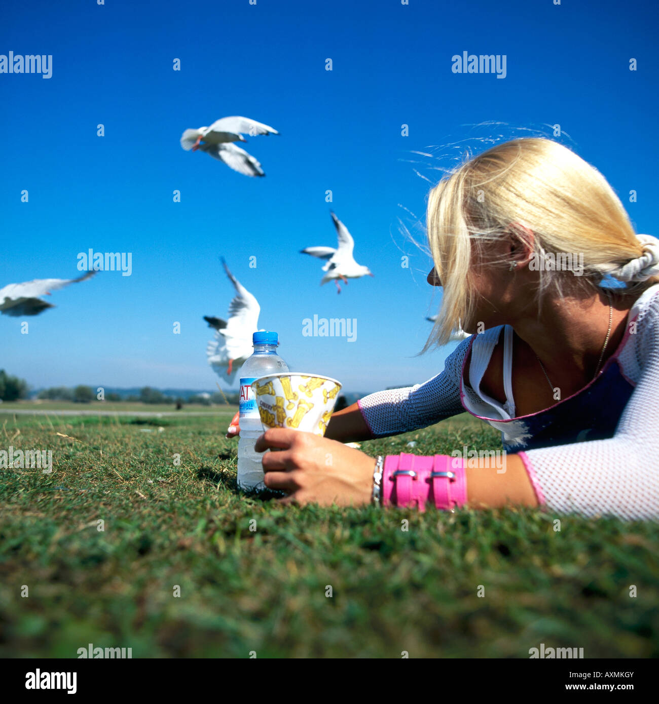 Young Woman Eating Stock Photo - Alamy