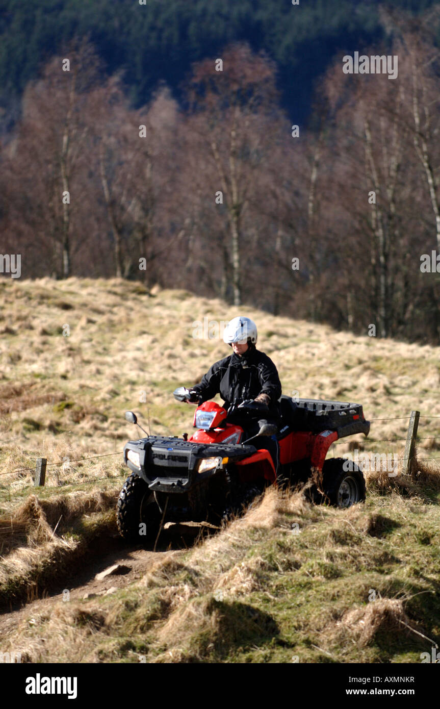 Quad bike riding and instruction in Dunkeld Scotland 12 03 2008 Stock ...