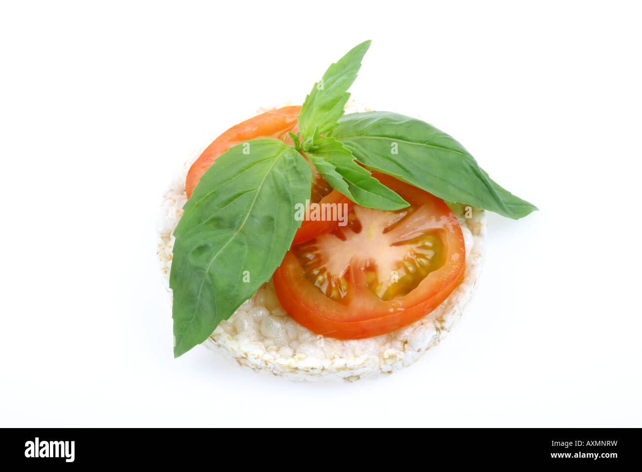 Rice Cake with Tomato and Basil Stock Photo - Alamy