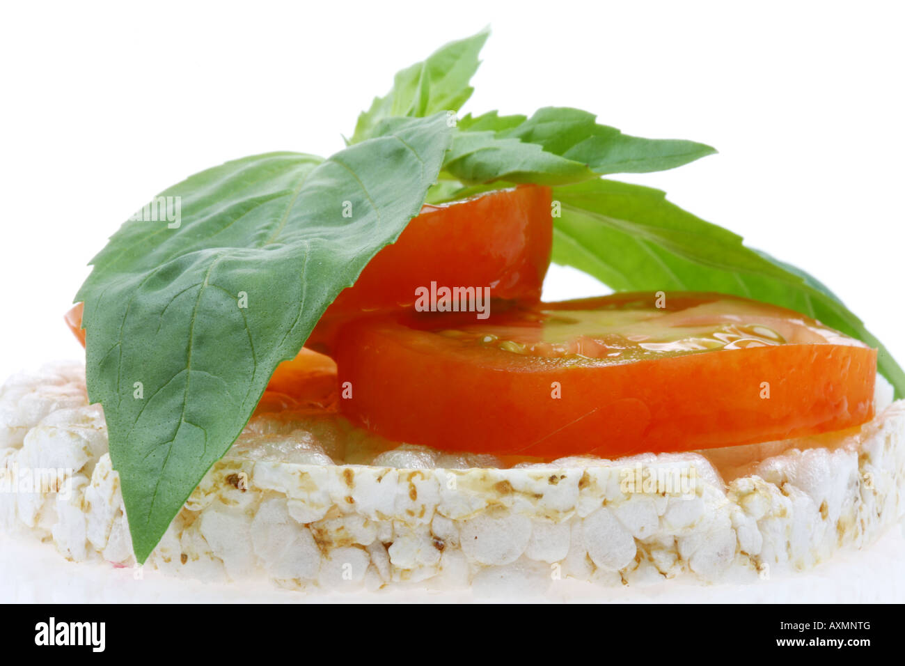 Rice Cake with Tomato and Basil Stock Photo - Alamy