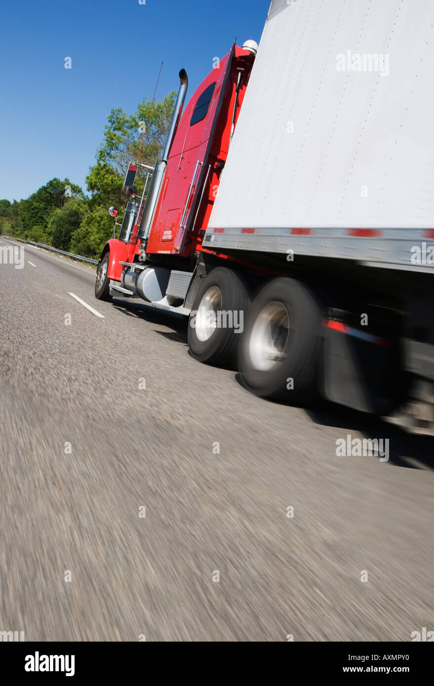 Side angle view of tractor trailer on highway Stock Photo - Alamy
