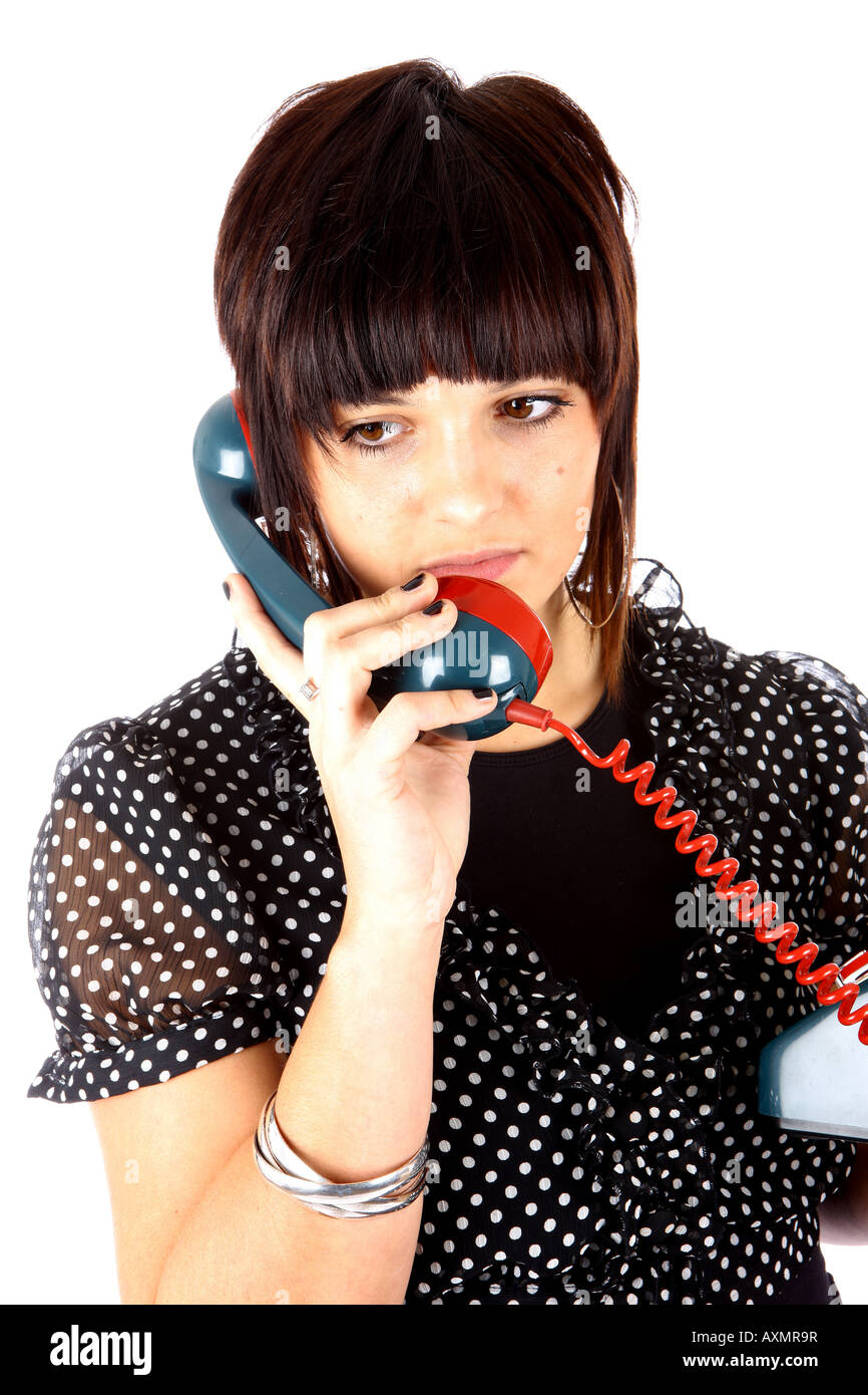 Young Teenage Woman Girl Making A Call On A Retro Land Line Telephone ...