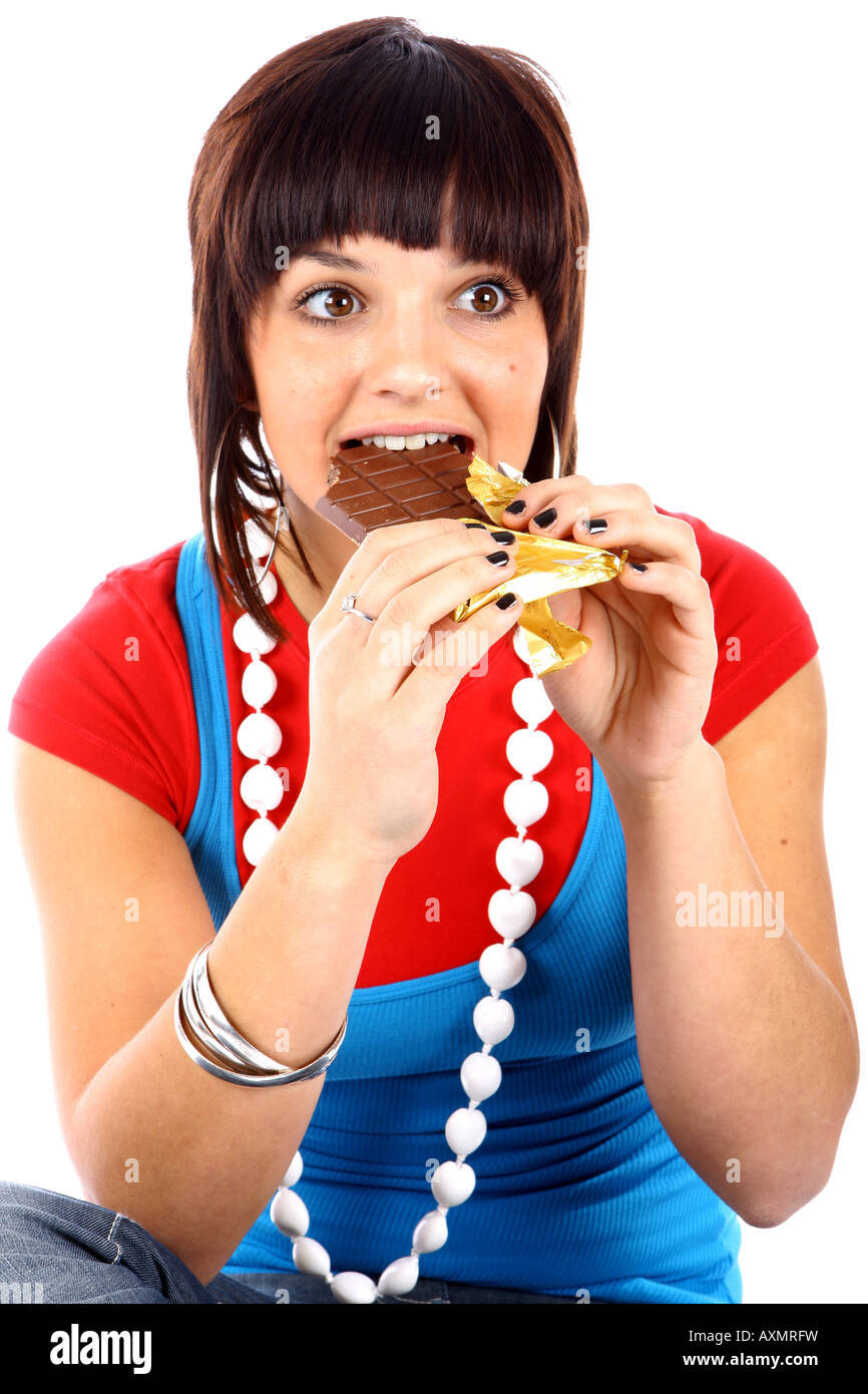 Teenage Girl Eating Chocolate Bar Model Released Stock Photo - Alamy