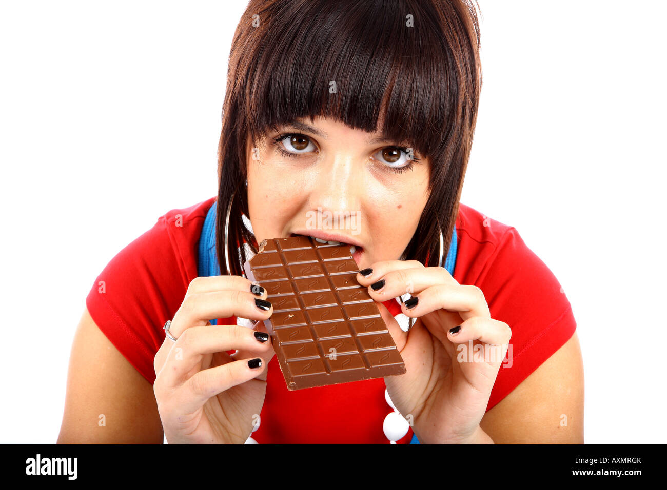 Teenage Girl Eating Chocolate Bar Model Released Stock Photo - Alamy