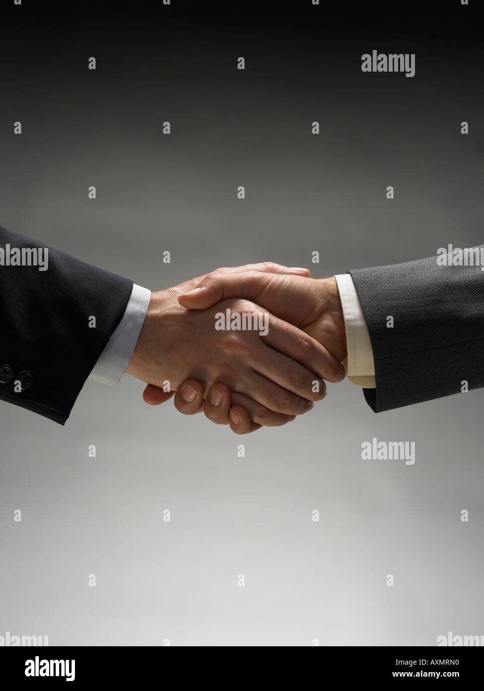 Two men shaking hands Stock Photo - Alamy