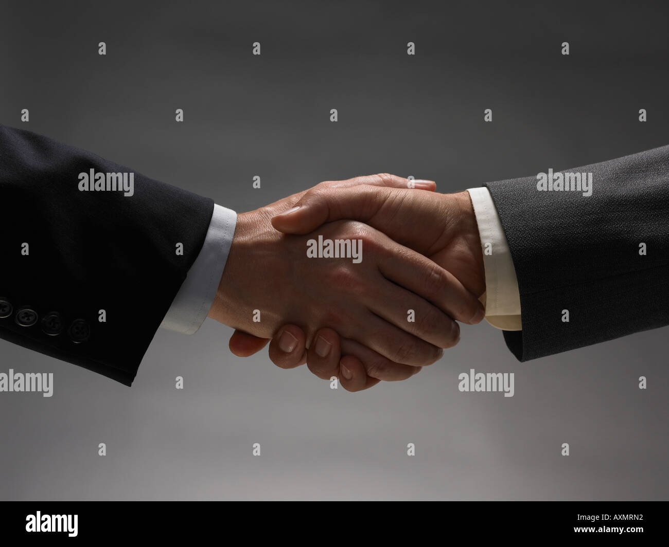 Two men shaking hands Stock Photo - Alamy