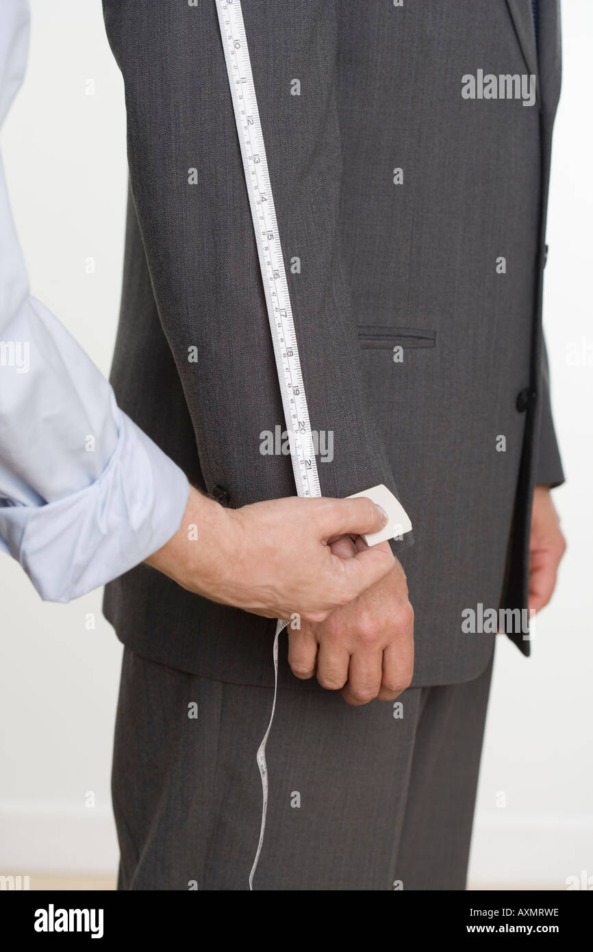 Tailor taking measurements customer hi-res stock photography and images ...