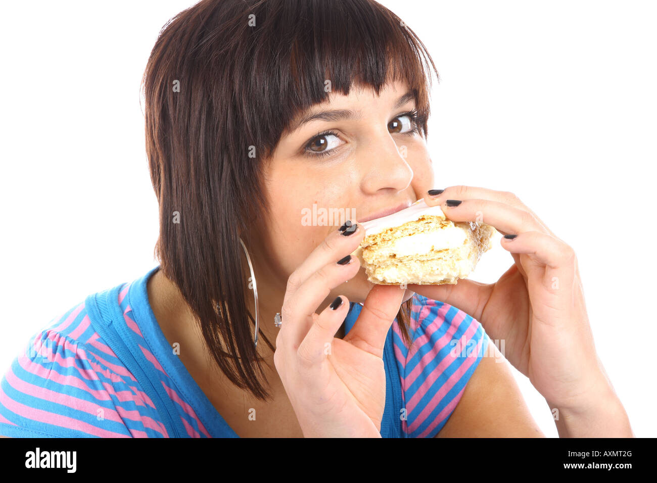 Teenage Girl Eating Cream Cake Model Released Stock Photo - Alamy