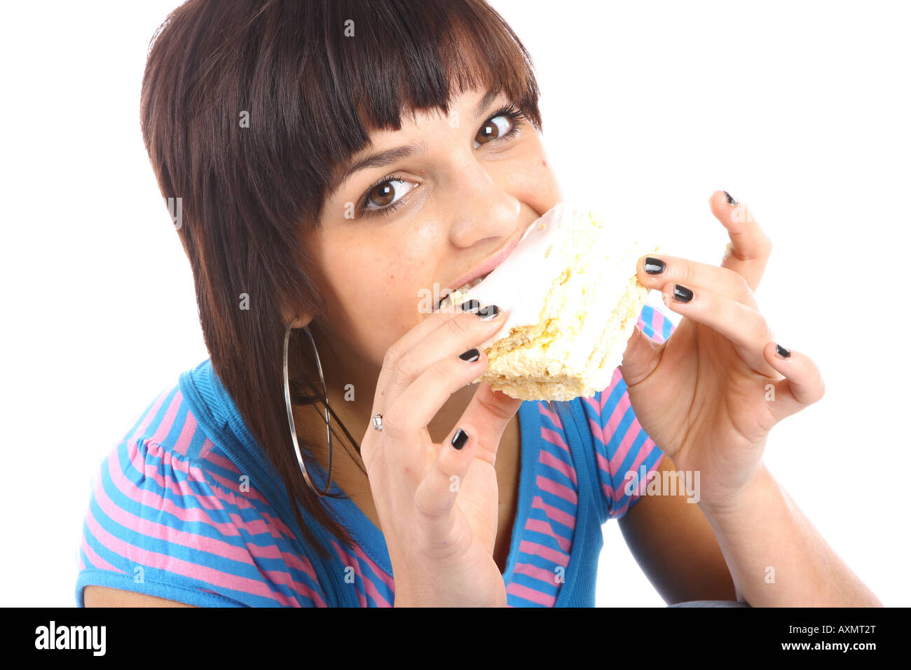 Teenage Girl Eating Cream Cake Model Released Stock Photo - Alamy