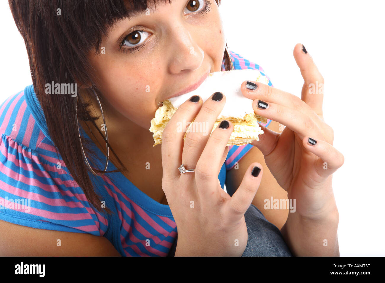 Teenage Girl Eating Cream Cake Model Released Stock Photo - Alamy