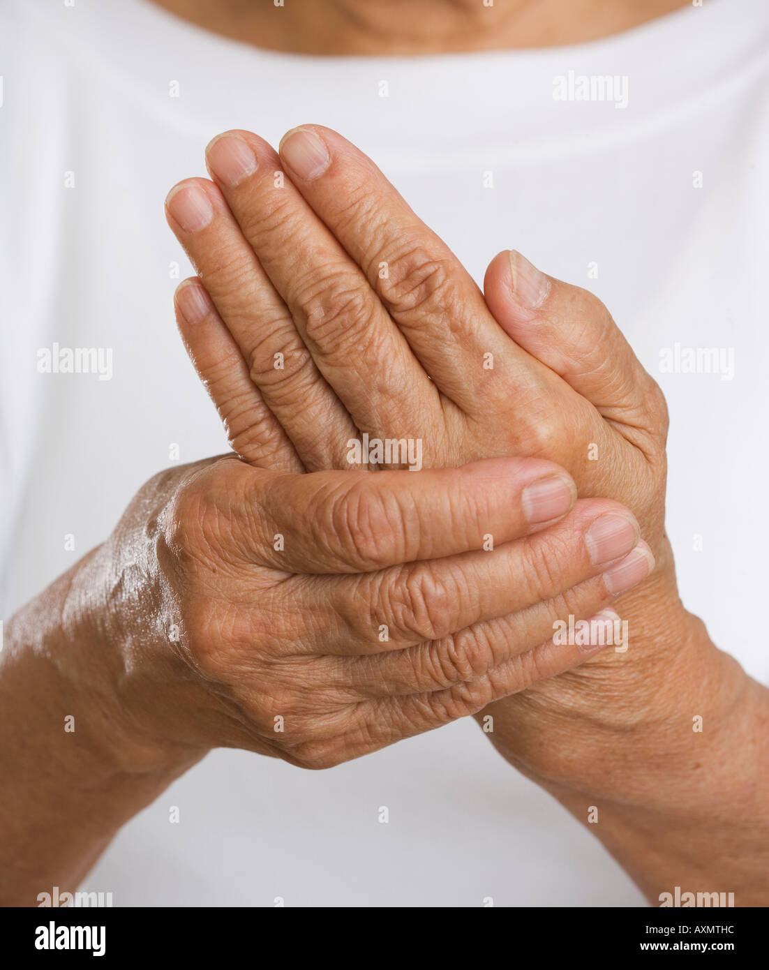 Woman rubbing hands together hi-res stock photography and images - Alamy