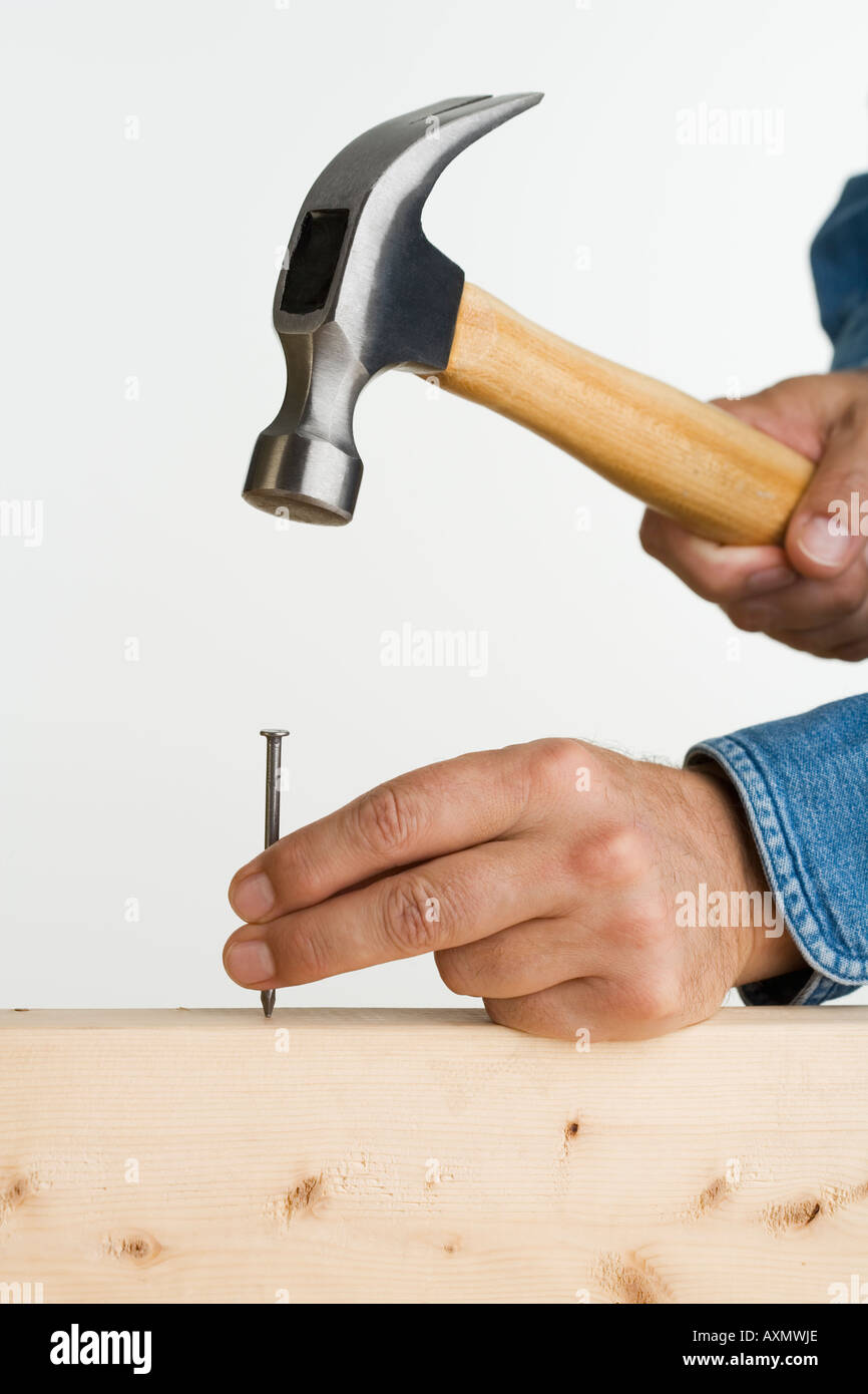 Man using hammer hi-res stock photography and images - Alamy