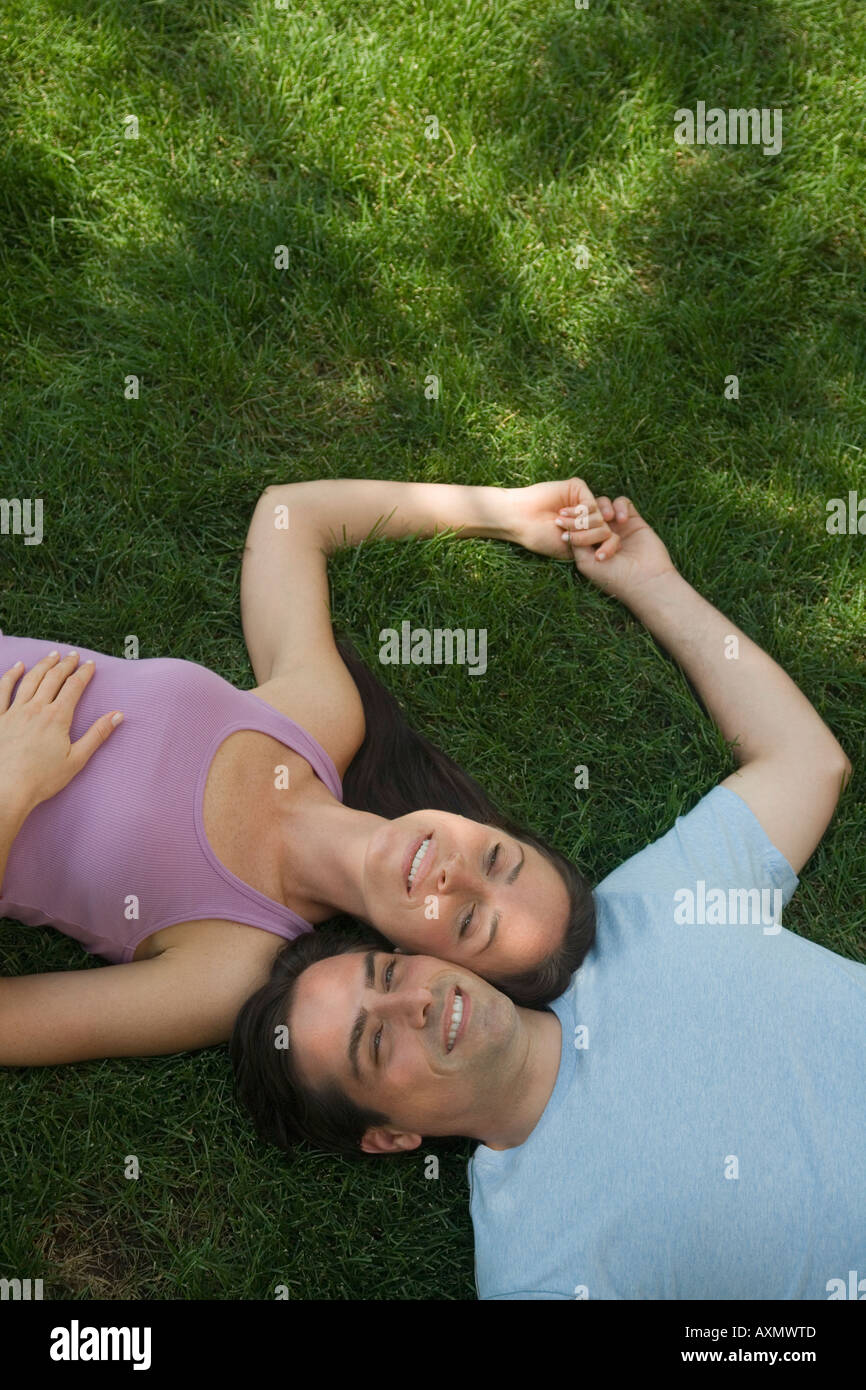 Two heads together men hi-res stock photography and images - Alamy