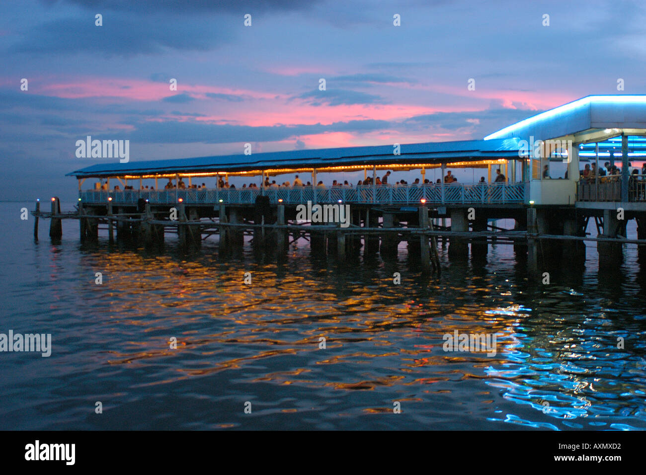 Restaurant pier at dusk Manila Philippines Stock Photo - Alamy
