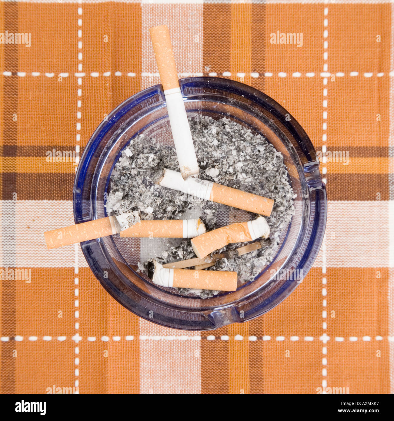 Still life of cigarettes in ashtray Stock Photo - Alamy