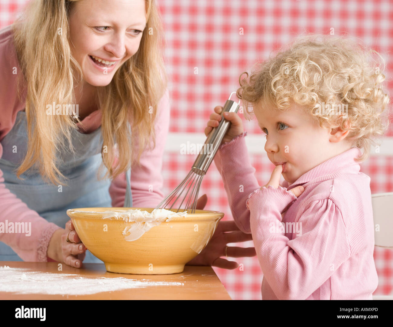 Mother and child cooking Stock Photo - Alamy